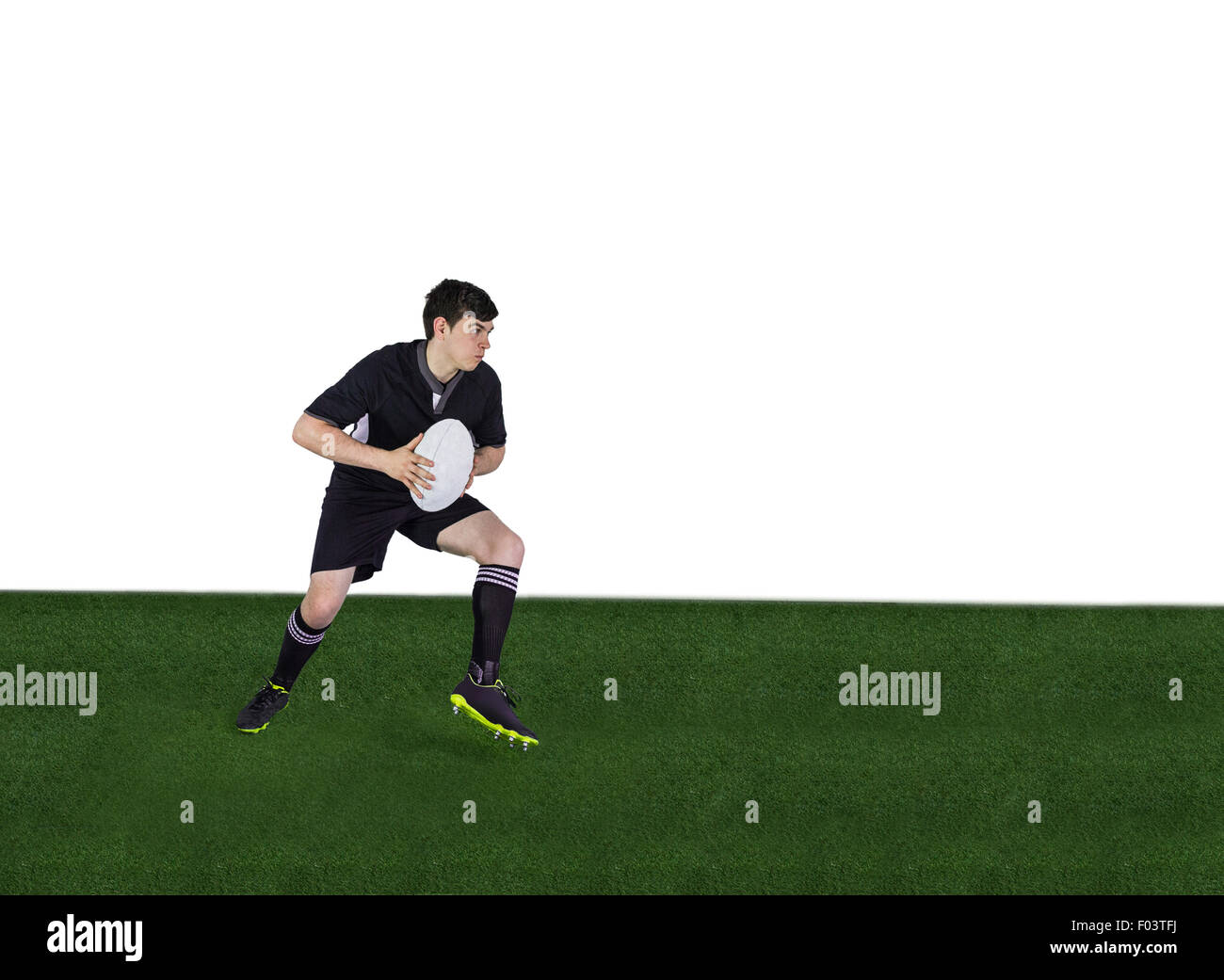 Rugby player running with the rugby ball Stock Photo - Alamy