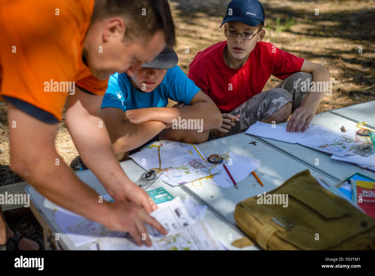 Teenagers map compass hi-res stock photography and images - Alamy