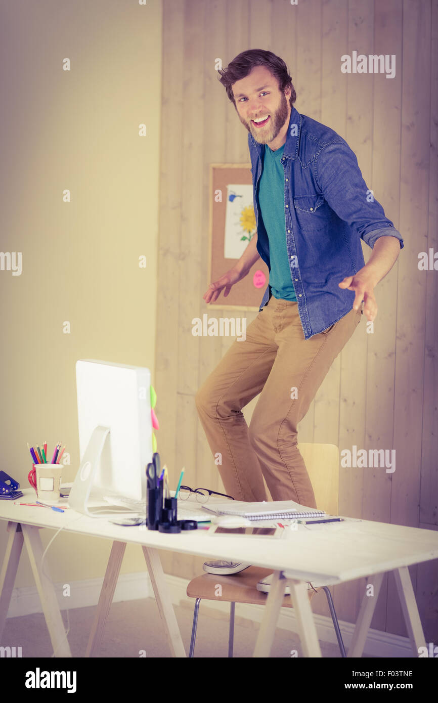 Man standing on chair hi-res stock photography and images - Alamy