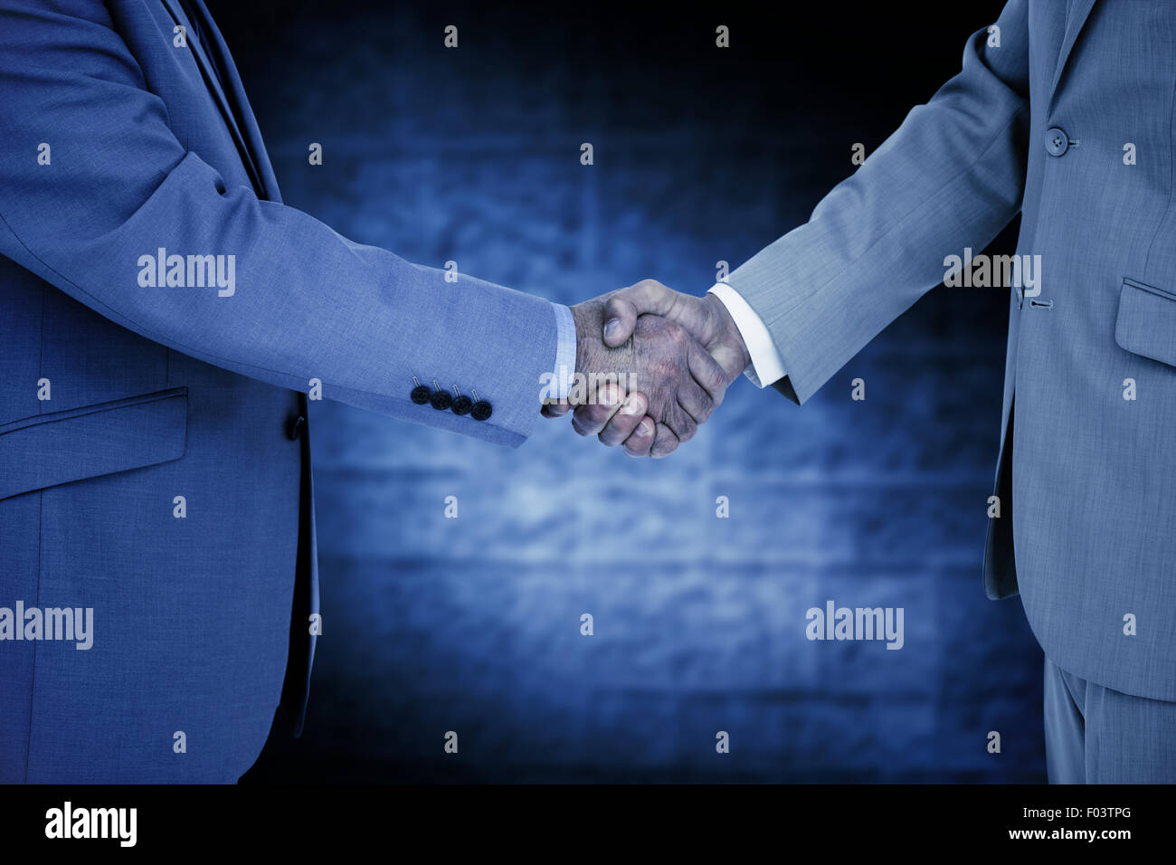 Composite image of side view of shaking hands Stock Photo - Alamy