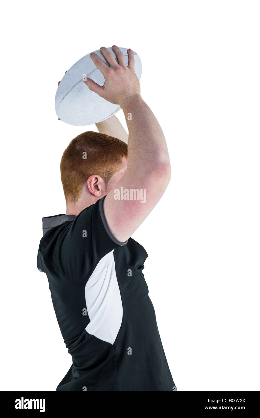 Rugby player about to throw a rugby ball Stock Photo - Alamy