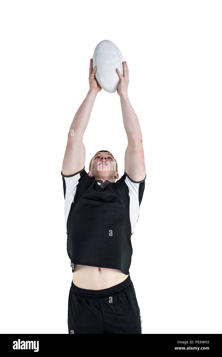 Rugby player catching a rugby ball Stock Photo - Alamy
