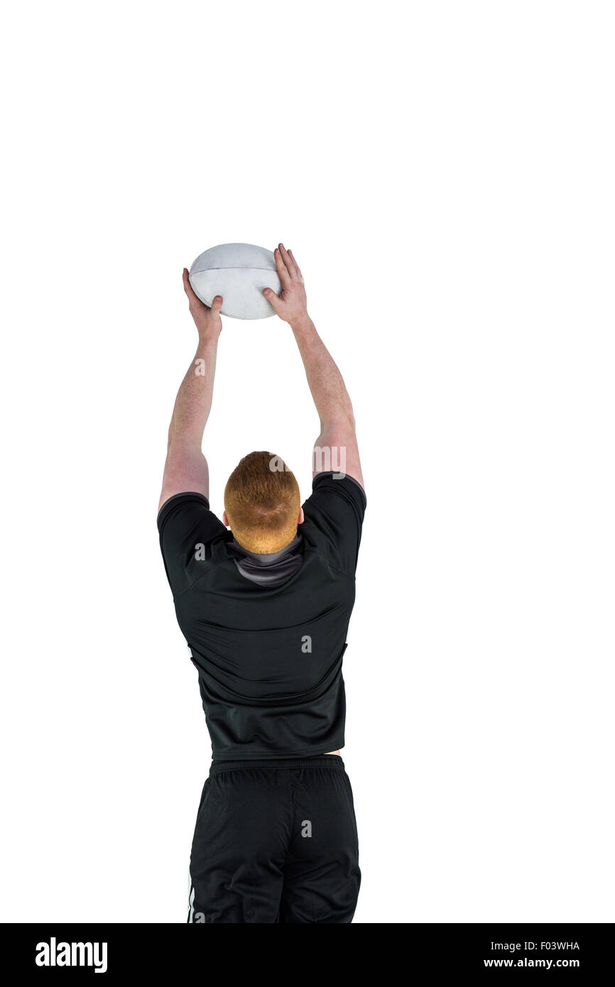 Rugby player catching a rugby ball Stock Photo - Alamy