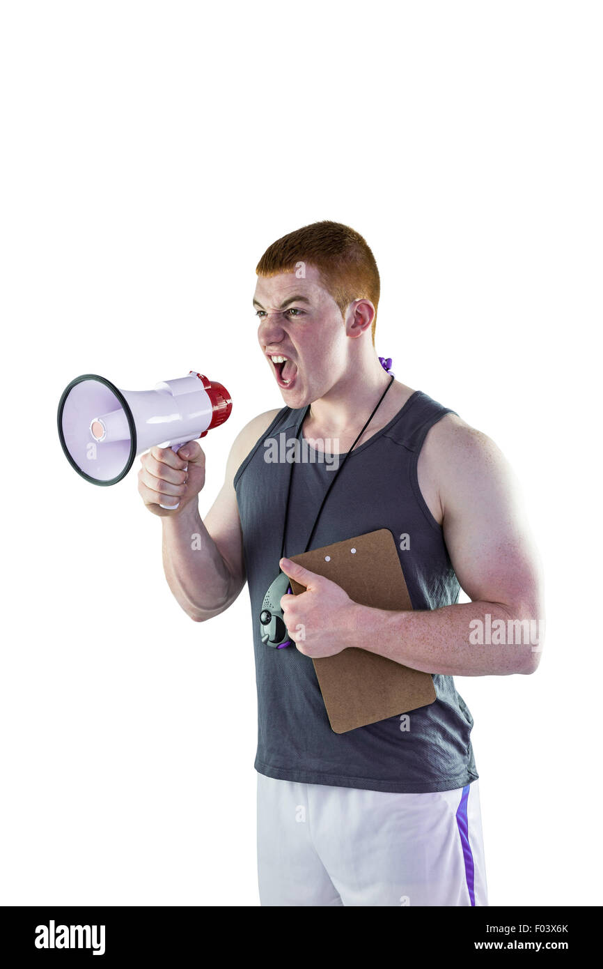 Angry personal trainer yelling through megaphone Stock Photo - Alamy