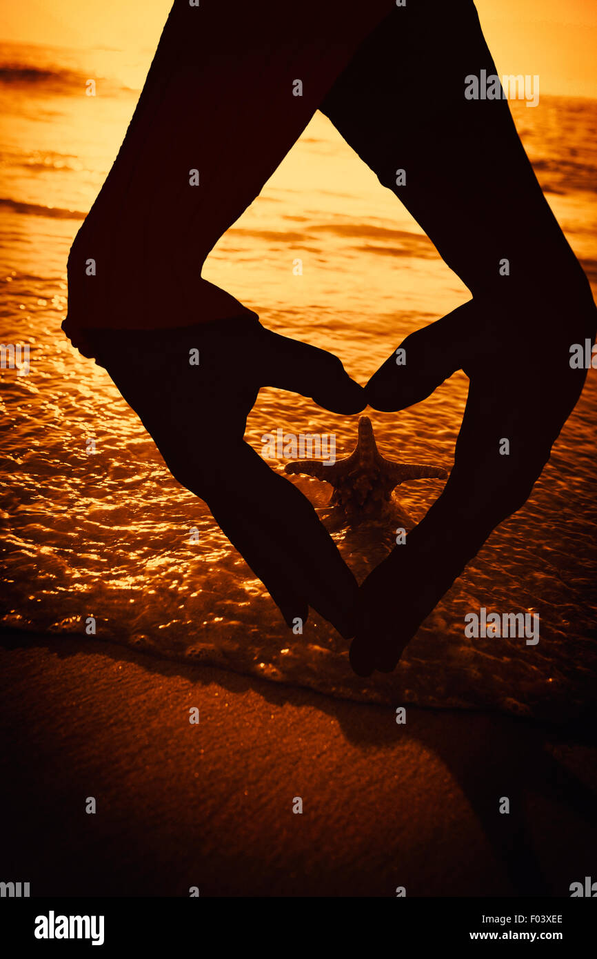 Couple heart hands close up hi-res stock photography and images - Alamy