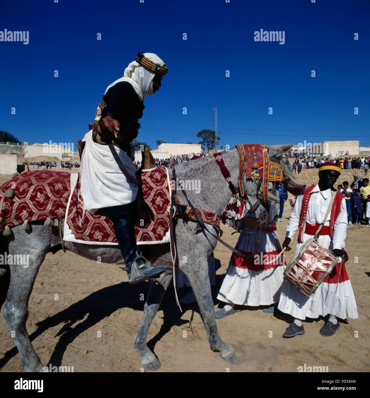 Berber horseman in traditional costume, Berber festival, Matmata ...