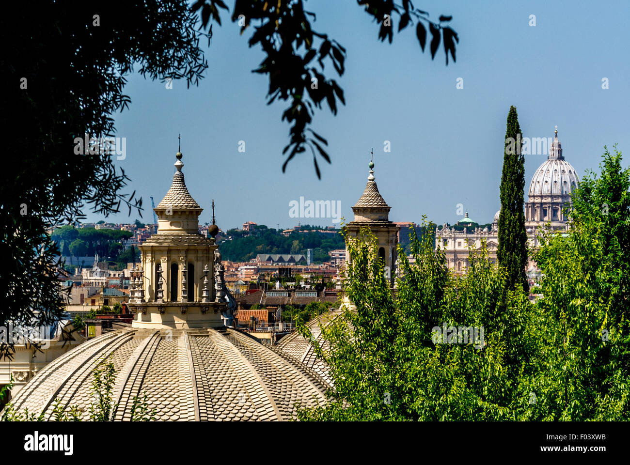 Domed roofs of the twin churches in the Piazza del Popolo. Shot from ...