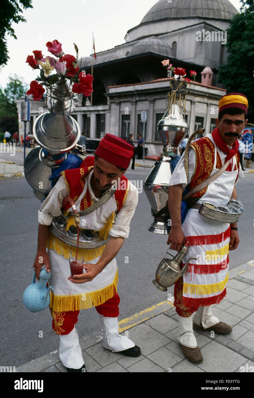 Tea vendors in traditional costumes, Istanbul, Turkey Stock Photo - Alamy