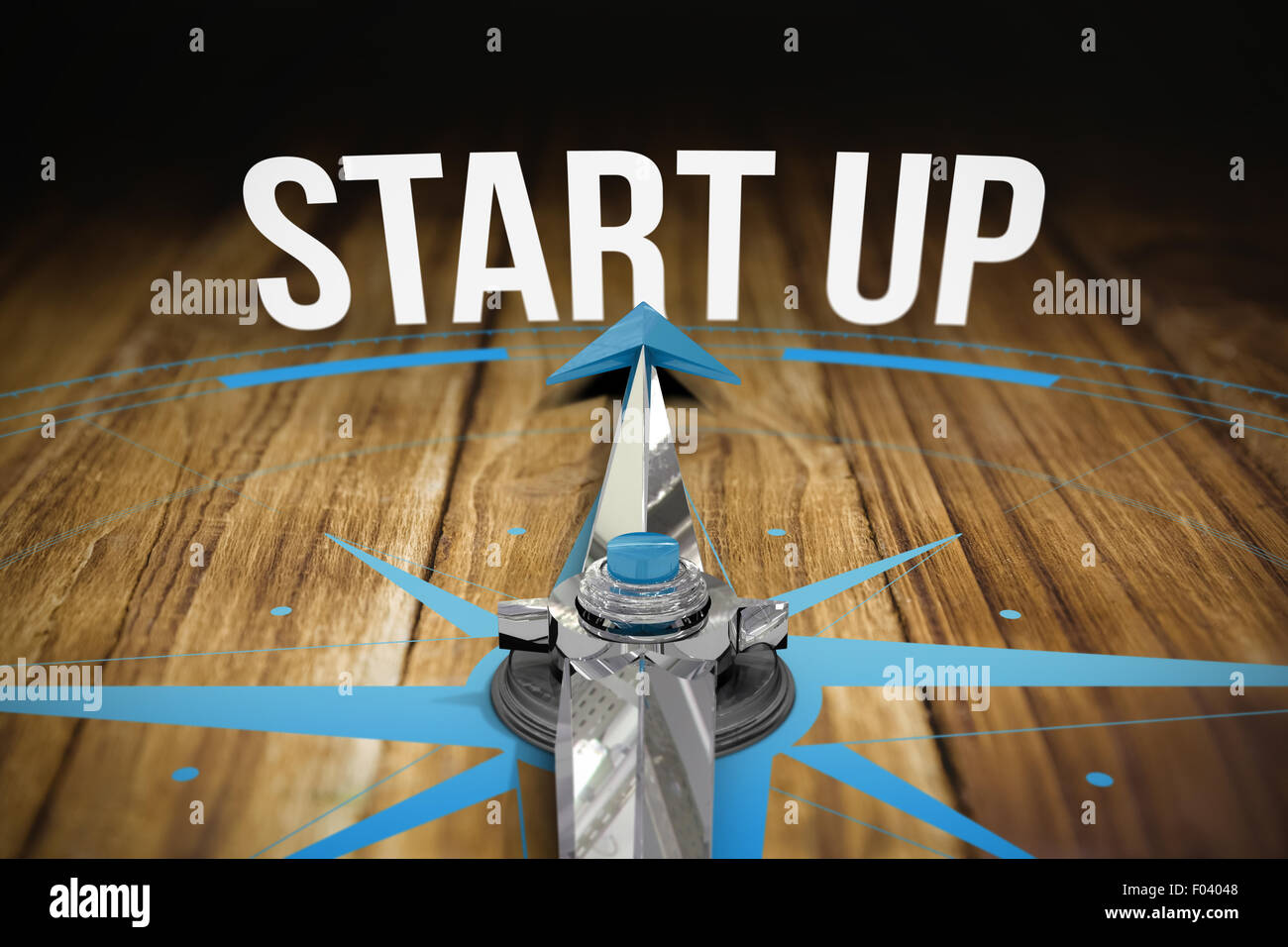Start up against wooden table Stock Photo - Alamy