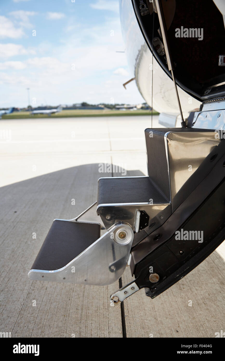 Closeup of steps leading into a waiting aircraft Stock Photo - Alamy