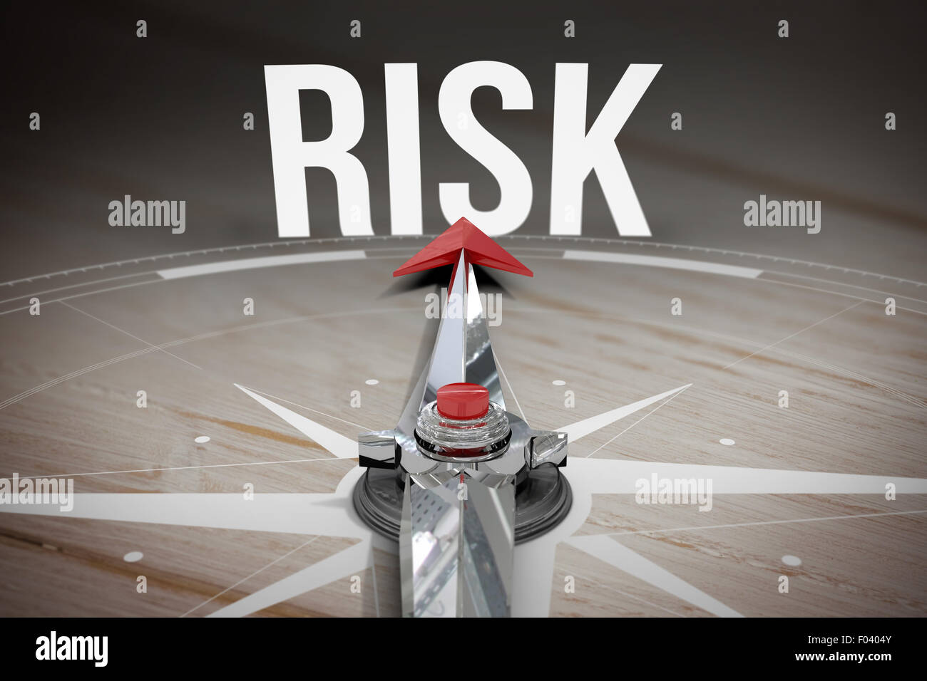 Risk against brown wooden background Stock Photo - Alamy