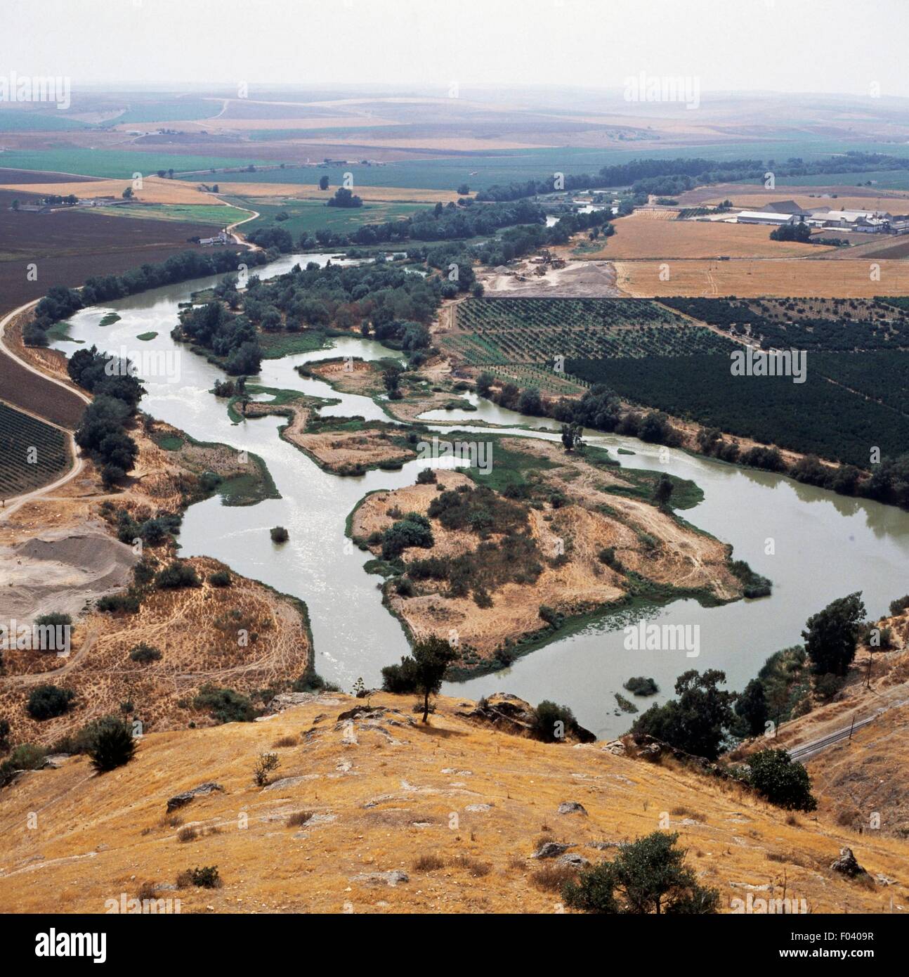 View of the Guadalquivir river that flows through the Andalucian ...