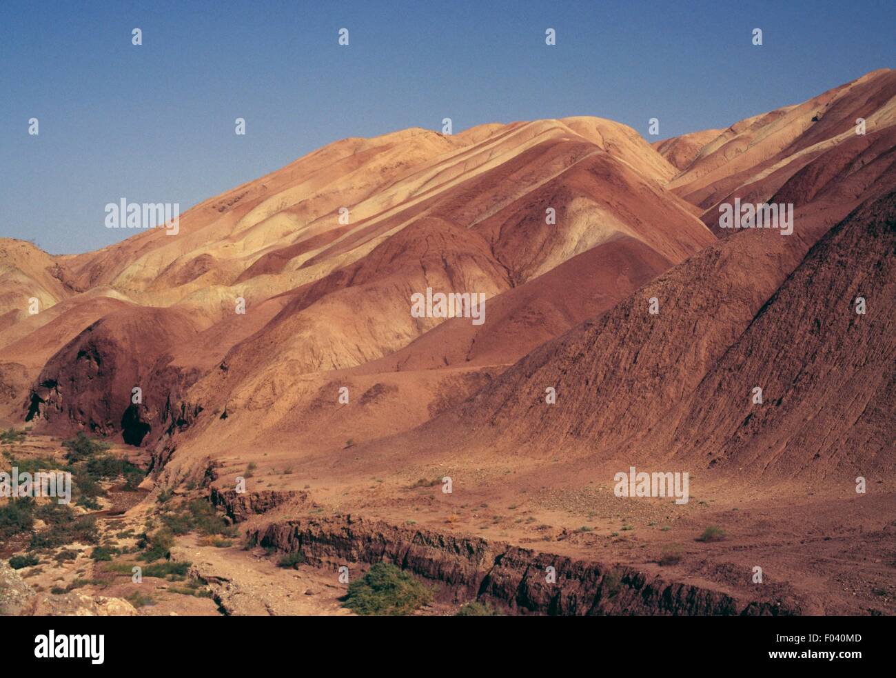 Rock formations shaped by erosion in the desert between Tehran and ...