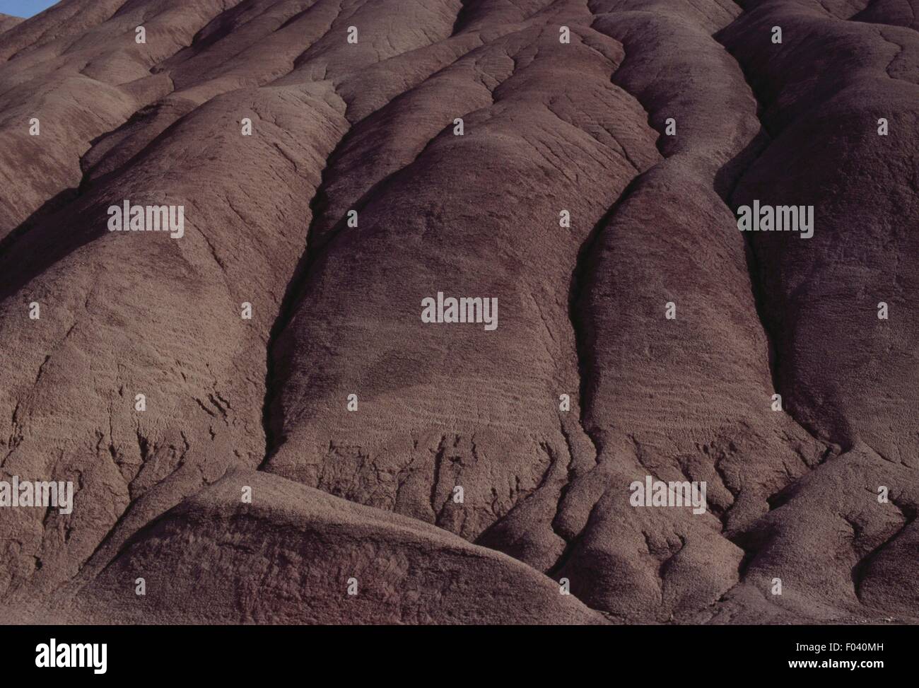 Rock formations shaped by erosion in the desert between Tehran and ...