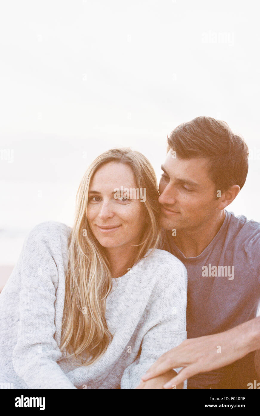 Arms around a man hi-res stock photography and images - Alamy