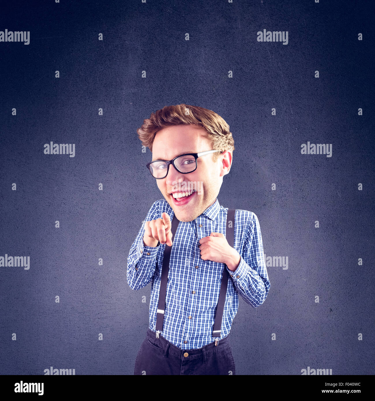 Composite image of geeky businessman pointing Stock Photo - Alamy