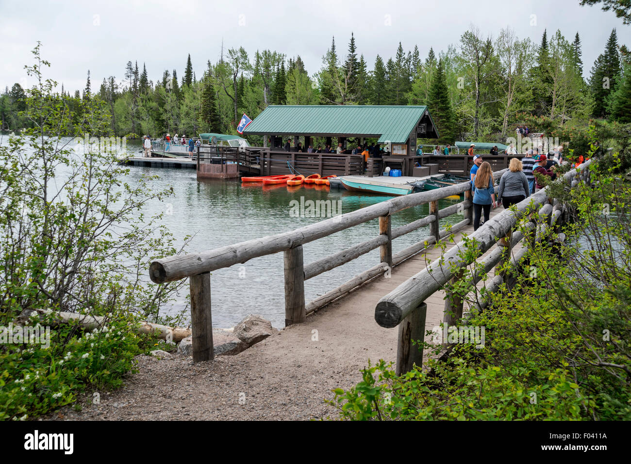 Pier for excursion boats and wooden footbridge, Grand Teton National ...
