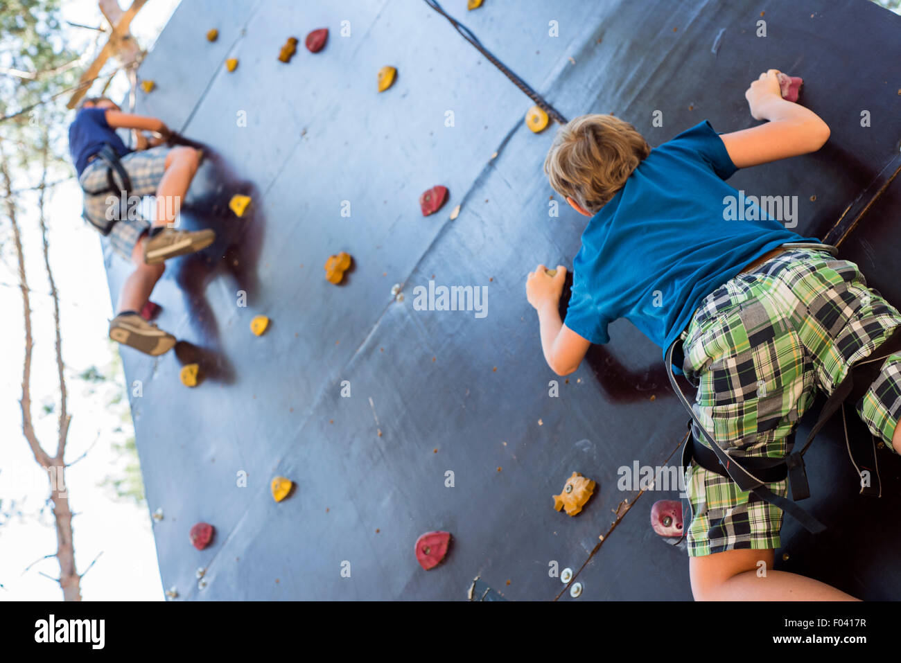 Climbing wall boy teen hi-res stock photography and images - Alamy