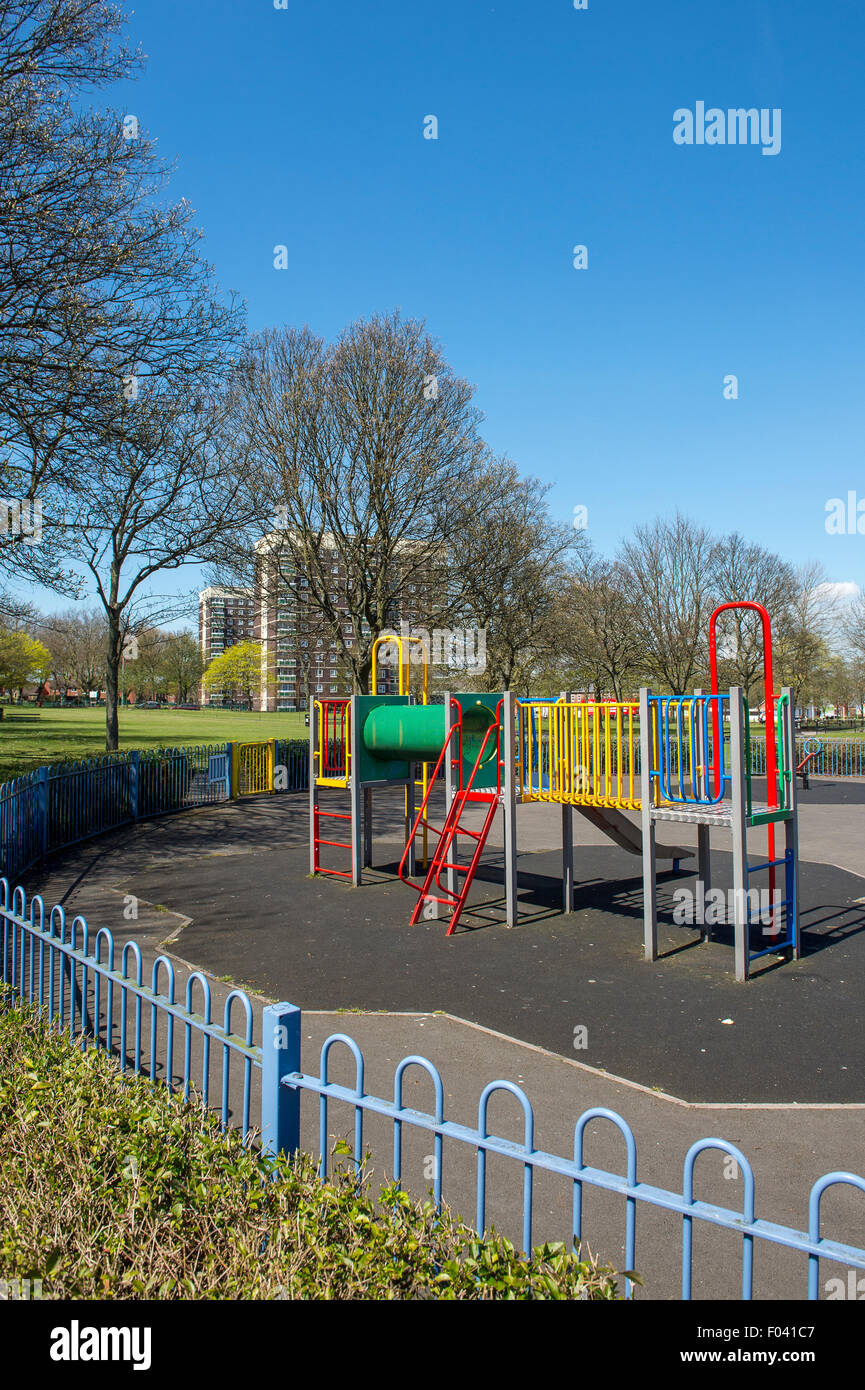 Childrens playground near blocks of flats in a city in England Stock ...