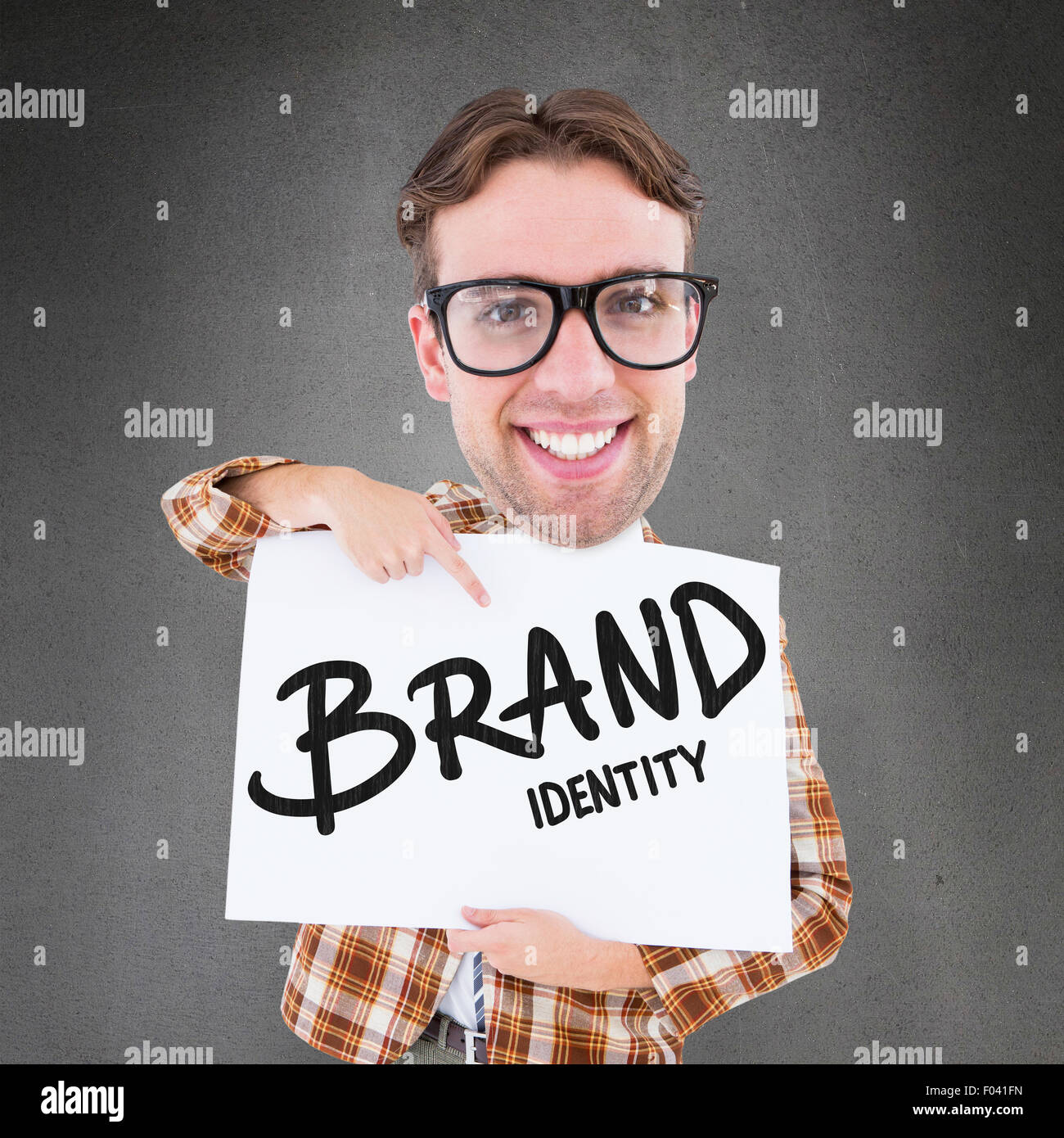 Composite image of geeky businessman showing card Stock Photo - Alamy