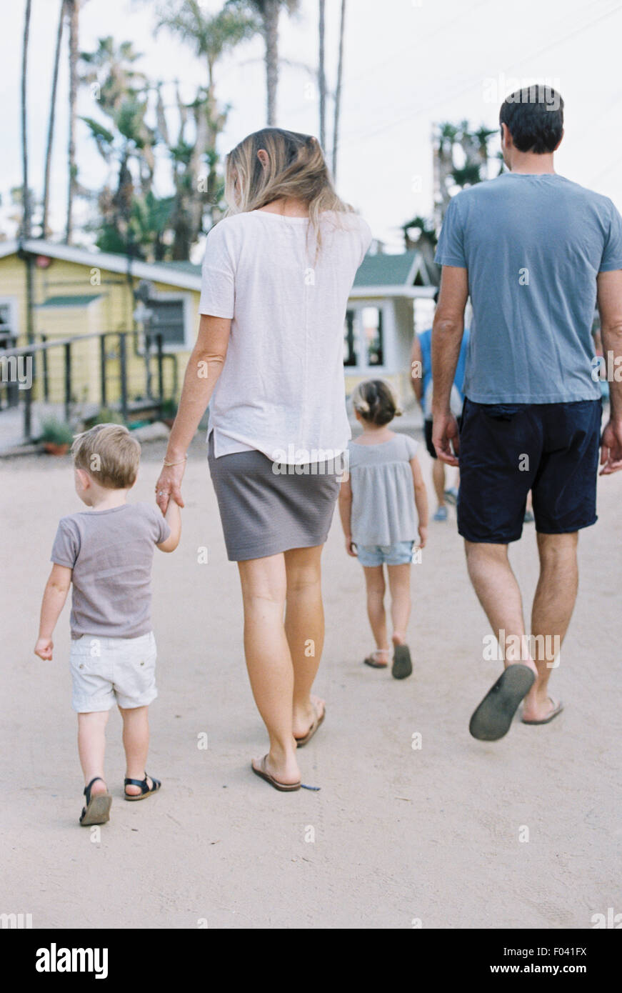 Family rear view girls walking hi-res stock photography and images - Alamy