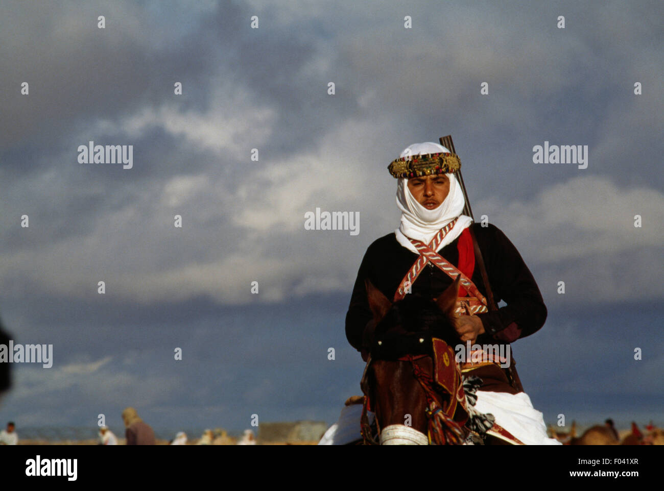Man in traditional Berbers clothes, Festival of the Sahara in Douz ...