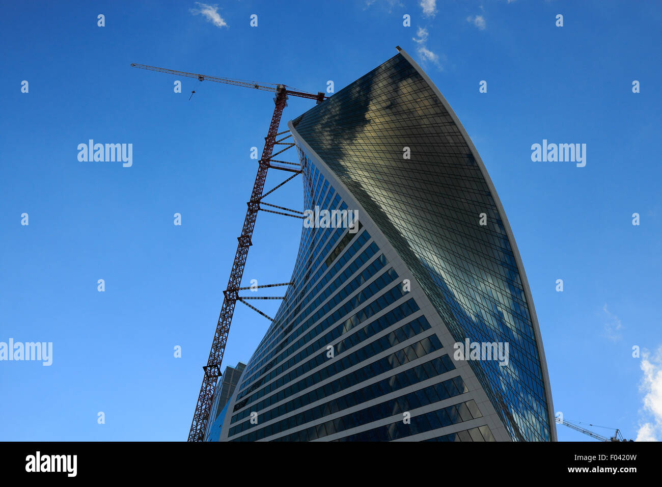 Curved crane hi-res stock photography and images - Alamy