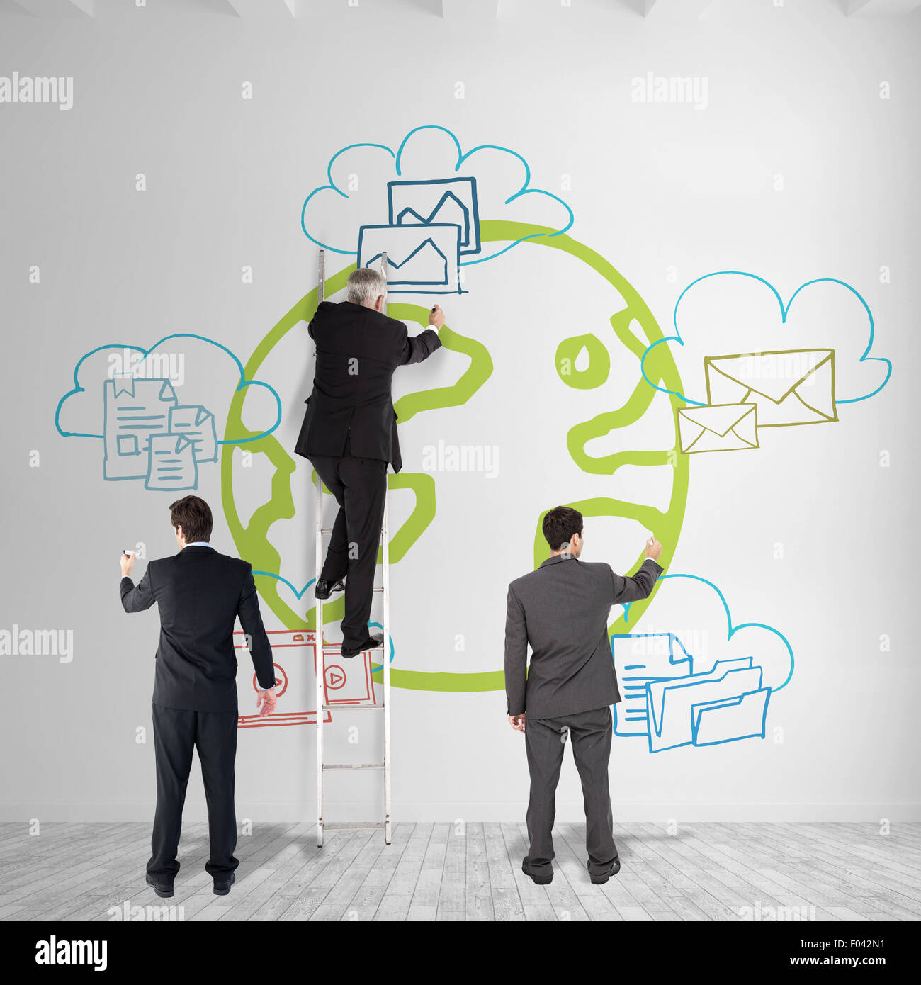 Composite image of business team writing Stock Photo - Alamy