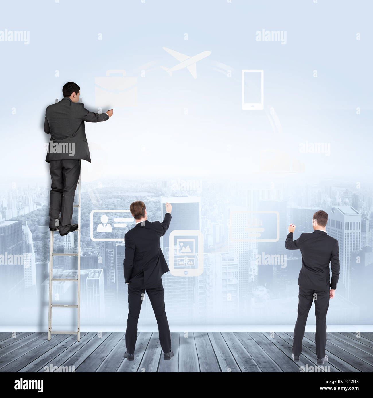 Composite image of business team writing Stock Photo - Alamy