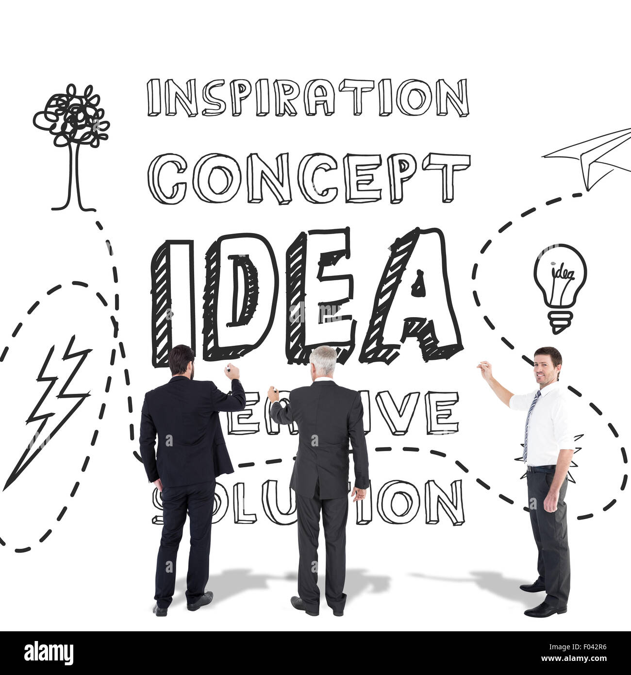 Composite image of business team writing Stock Photo - Alamy