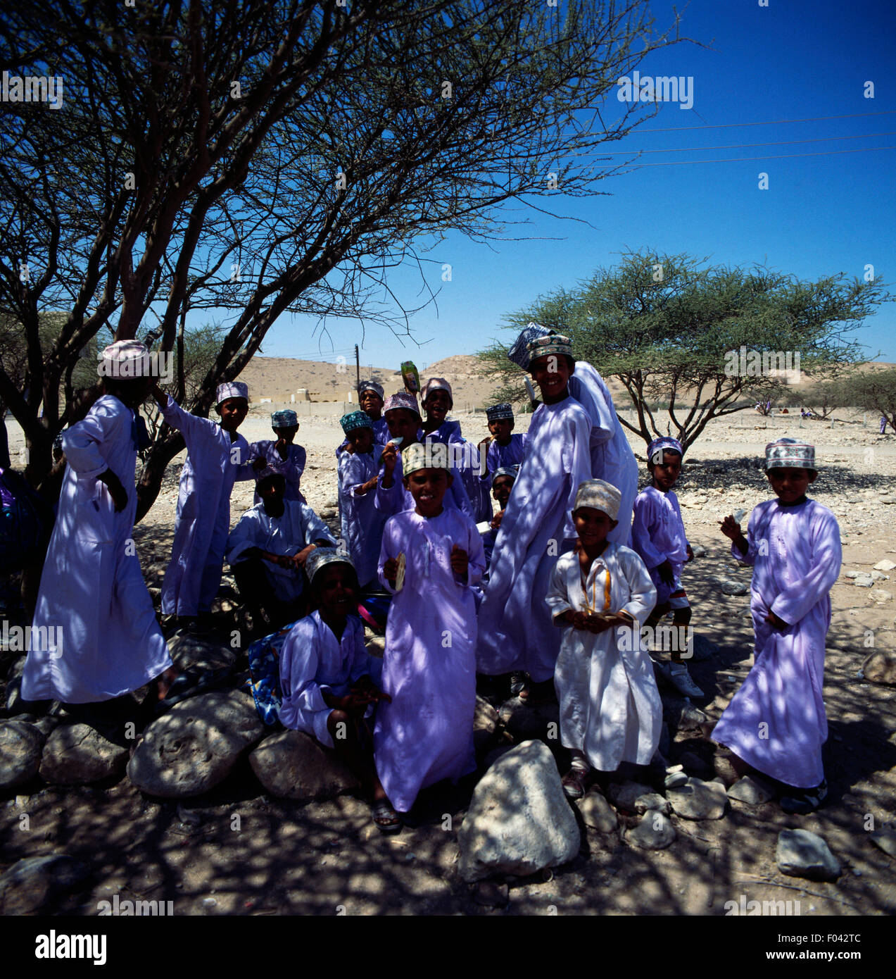 Children in traditional clothes, Oman Stock Photo - Alamy