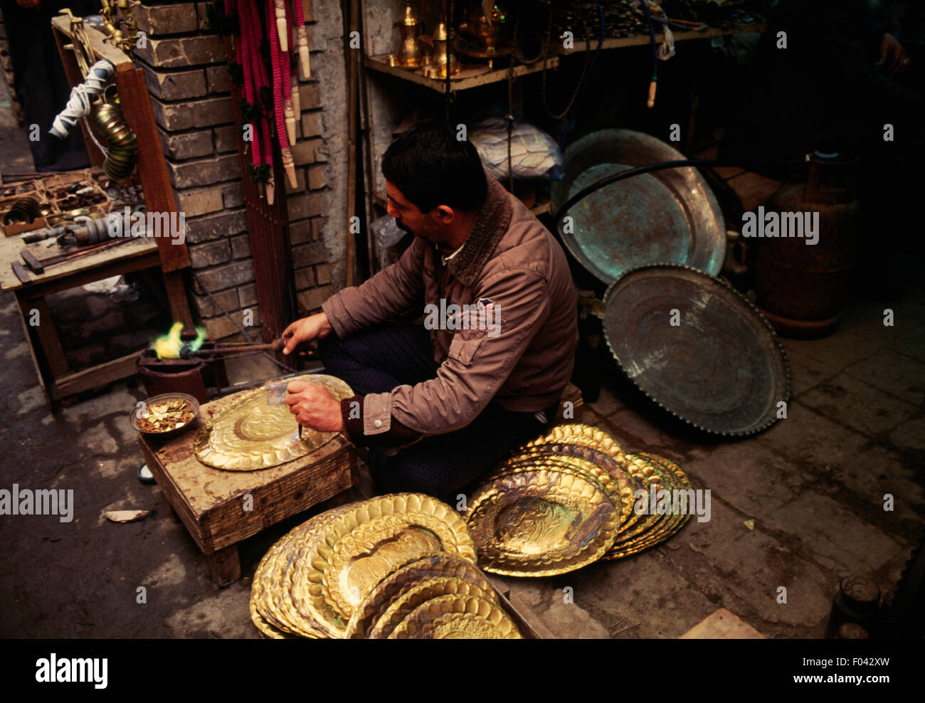 Working on copper, Baghdad, Iraq Stock Photo - Alamy