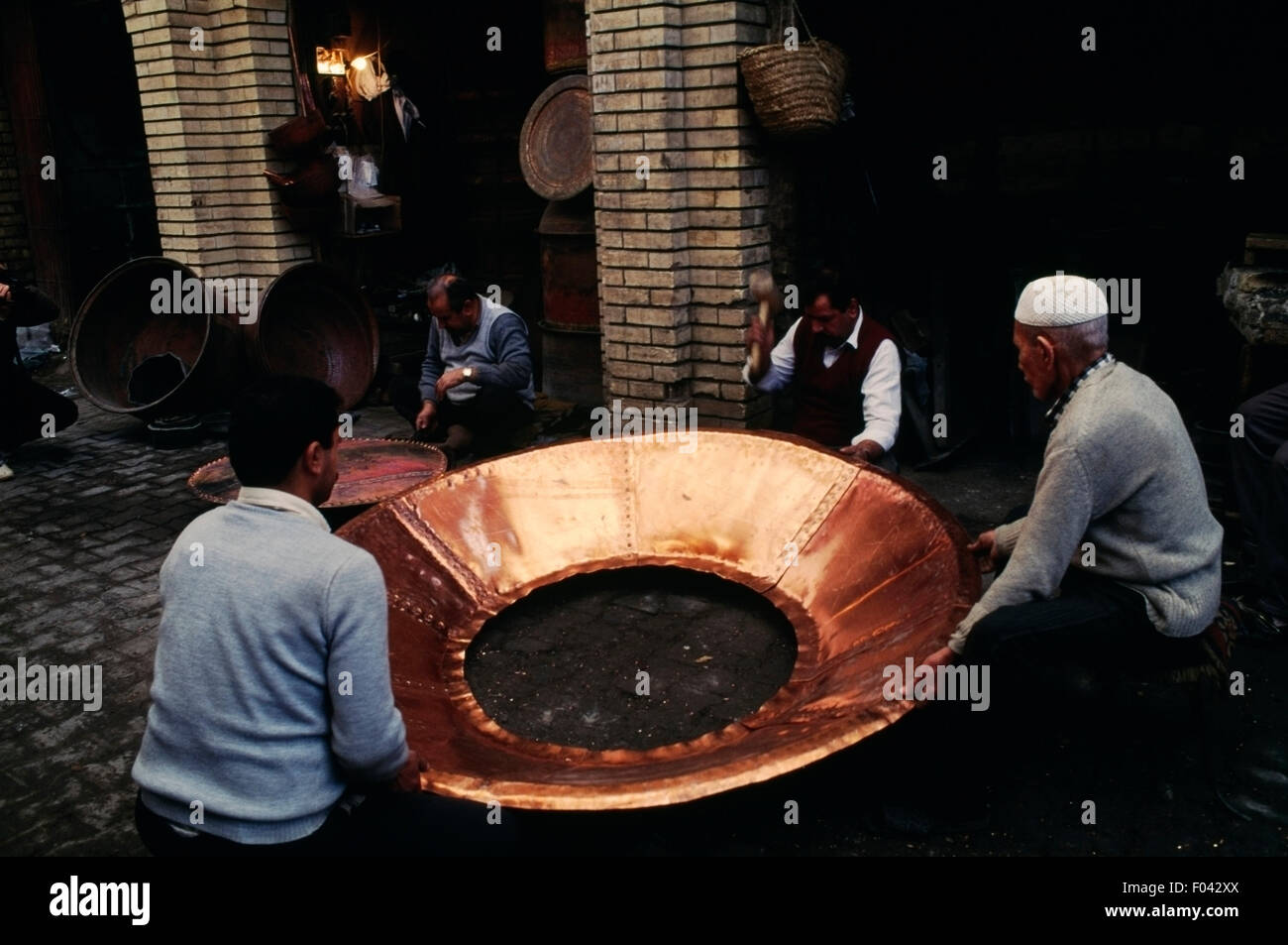 Working on copper, Baghdad, Iraq Stock Photo - Alamy