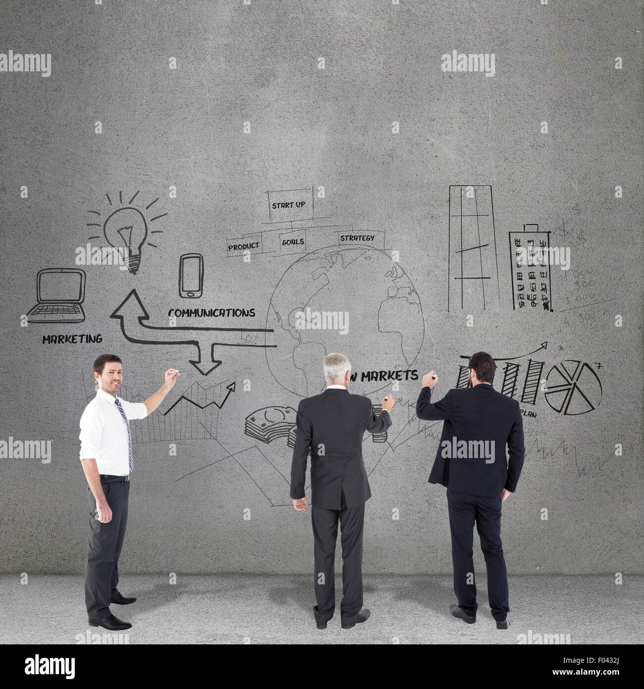 Composite image of business team writing Stock Photo - Alamy