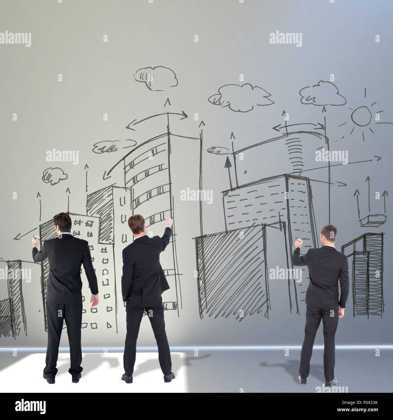 Composite image of business team writing Stock Photo - Alamy