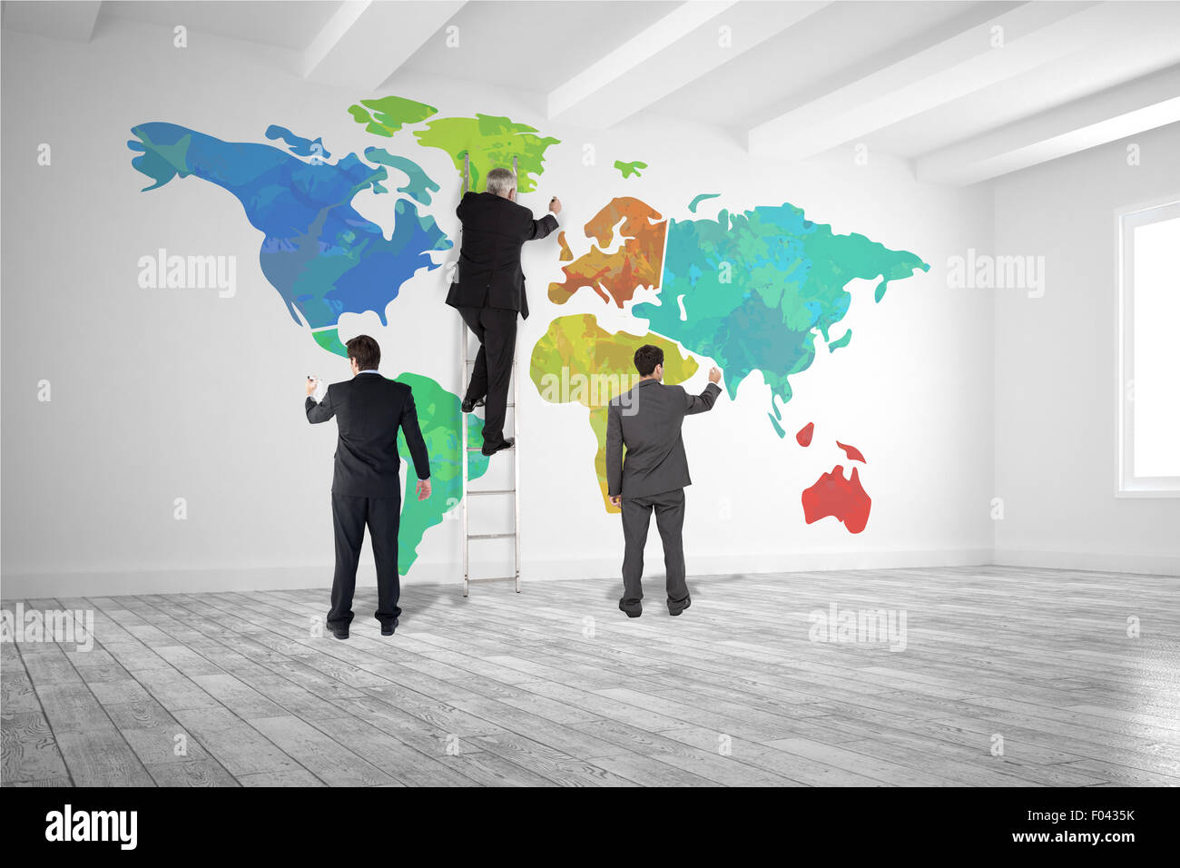 Composite image of business team writing Stock Photo - Alamy