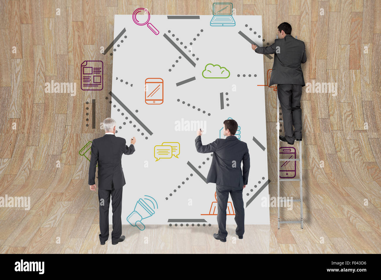 Composite image of business team writing Stock Photo - Alamy
