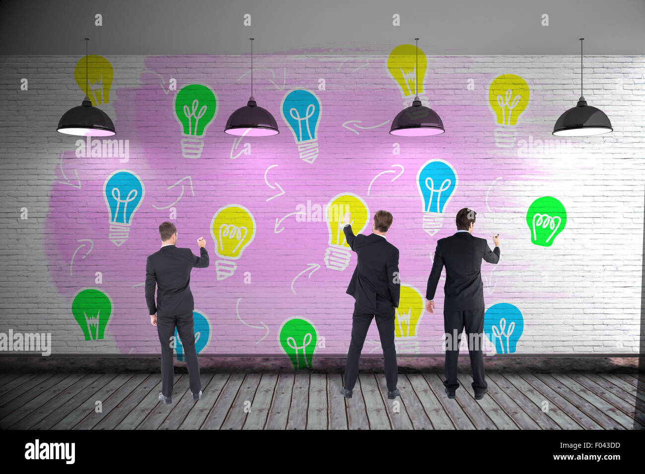 Composite image of business team writing Stock Photo - Alamy