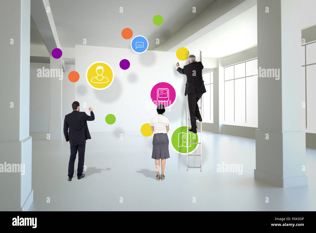 Composite image of business team writing Stock Photo - Alamy