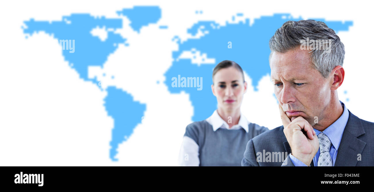 Composite image of business team thinking Stock Photo - Alamy