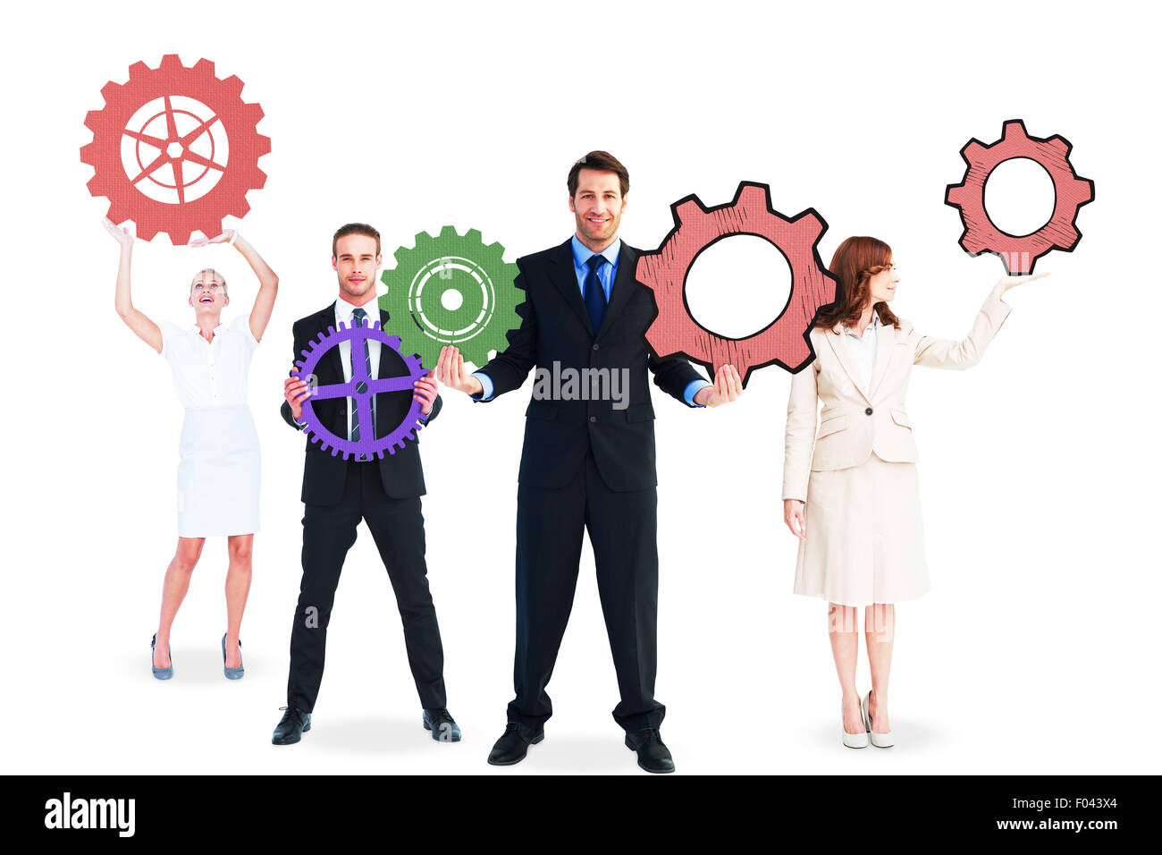 Business people holding large cogs Stock Photo - Alamy