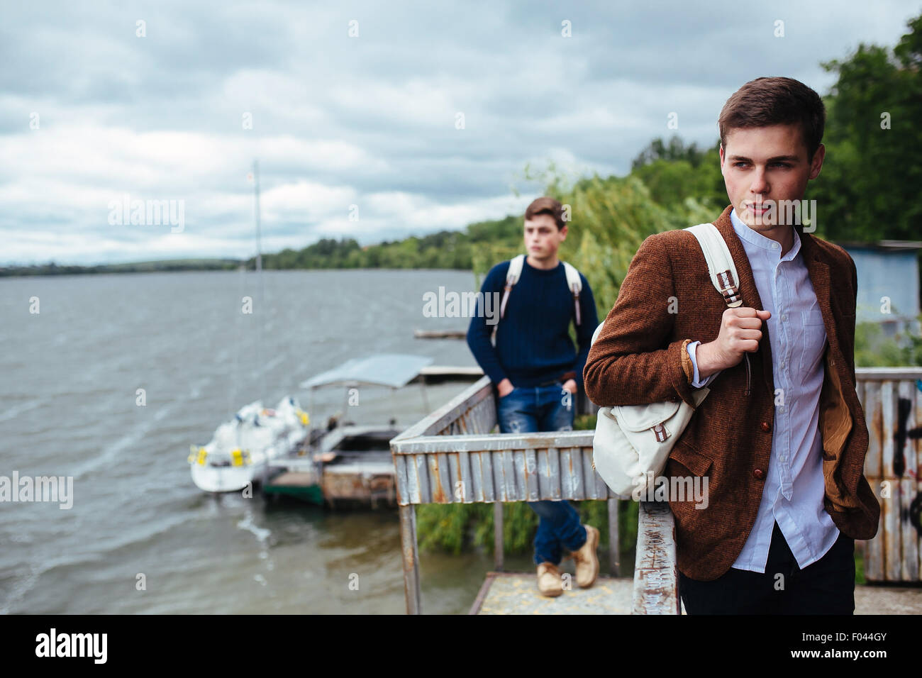 two young guys standing on a pier Stock Photo - Alamy two young guys standing on a pier Stock Photo - Alamy
