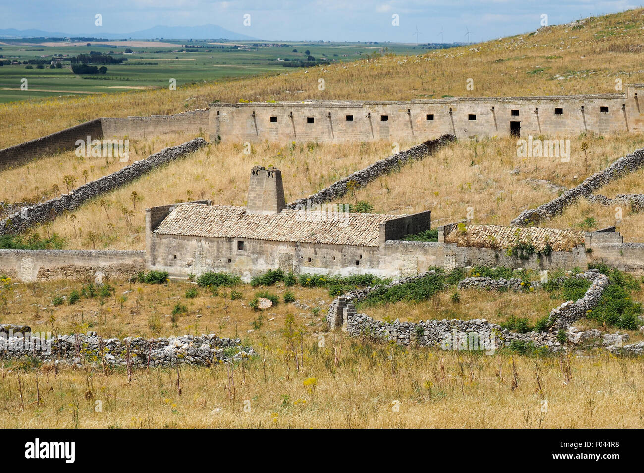 Abandoned farm or factory on the side of a hill Stock Photo - Alamy