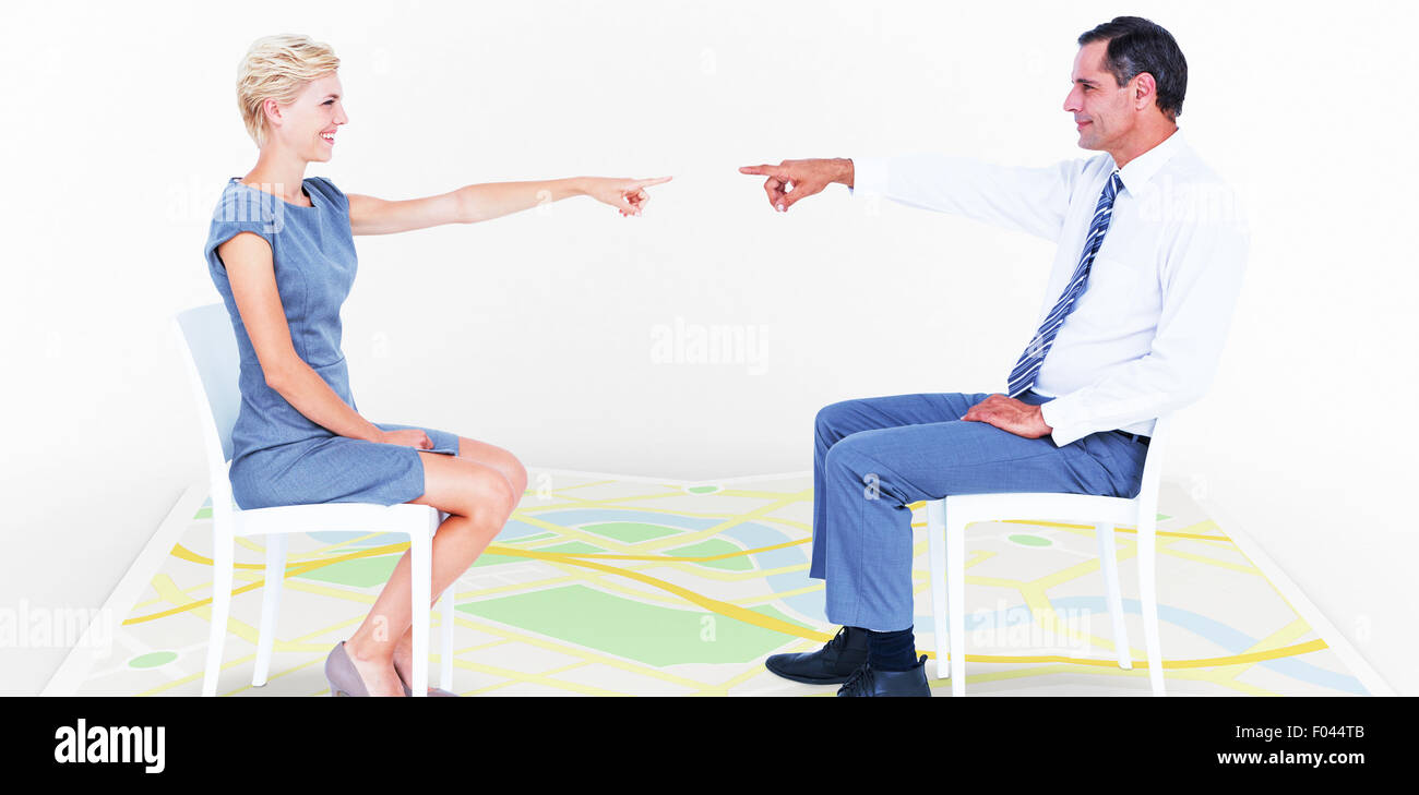 Man and woman pointing at each other hi-res stock photography and ...