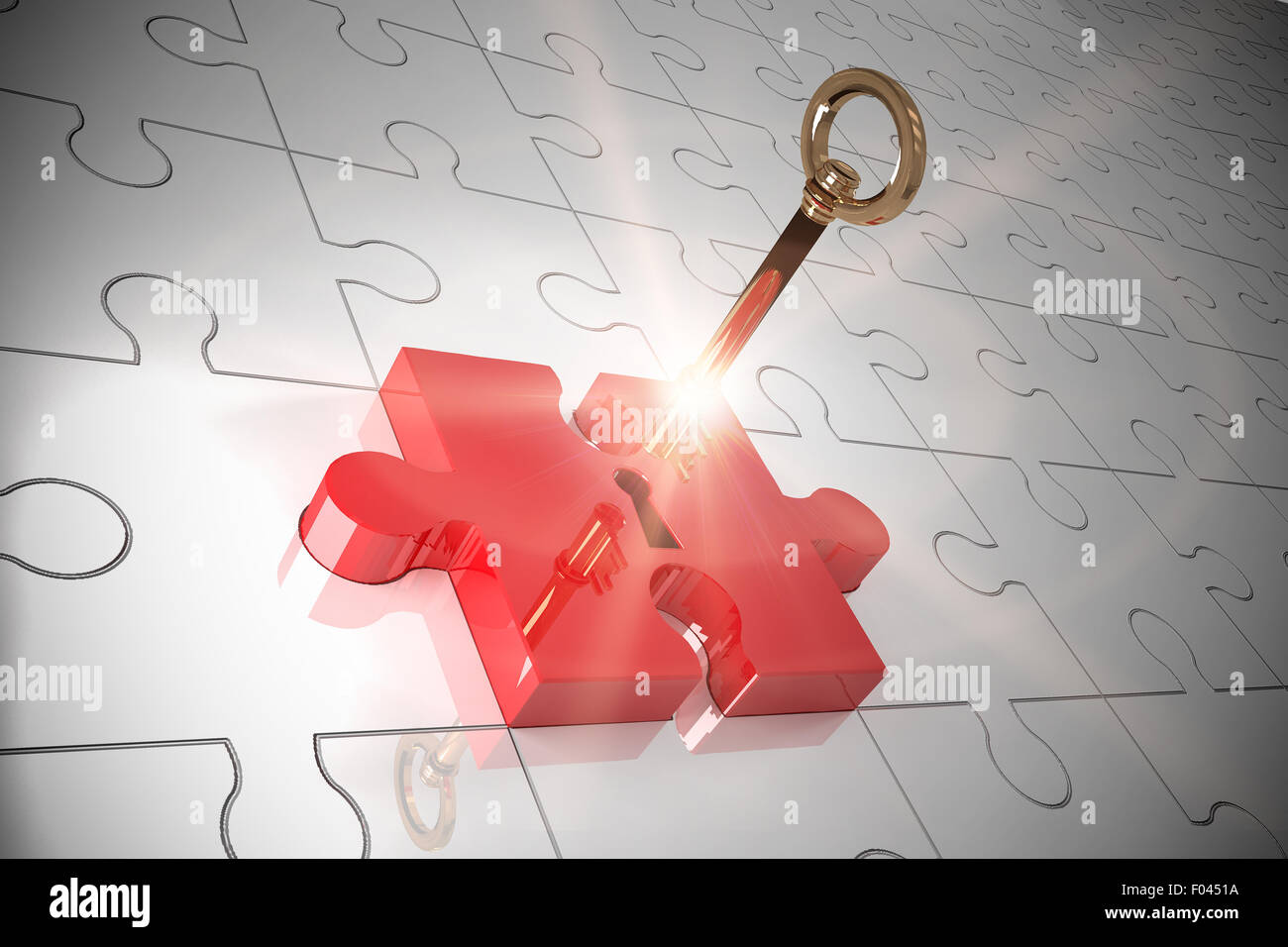 Key unlocking jigsaw Stock Photo - Alamy