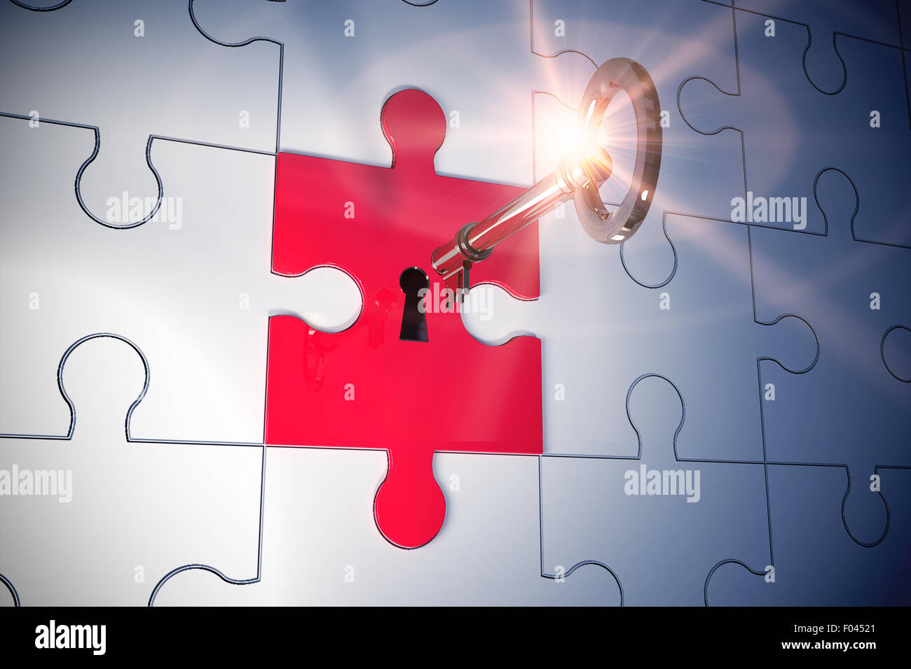 Key unlocking jigsaw Stock Photo - Alamy