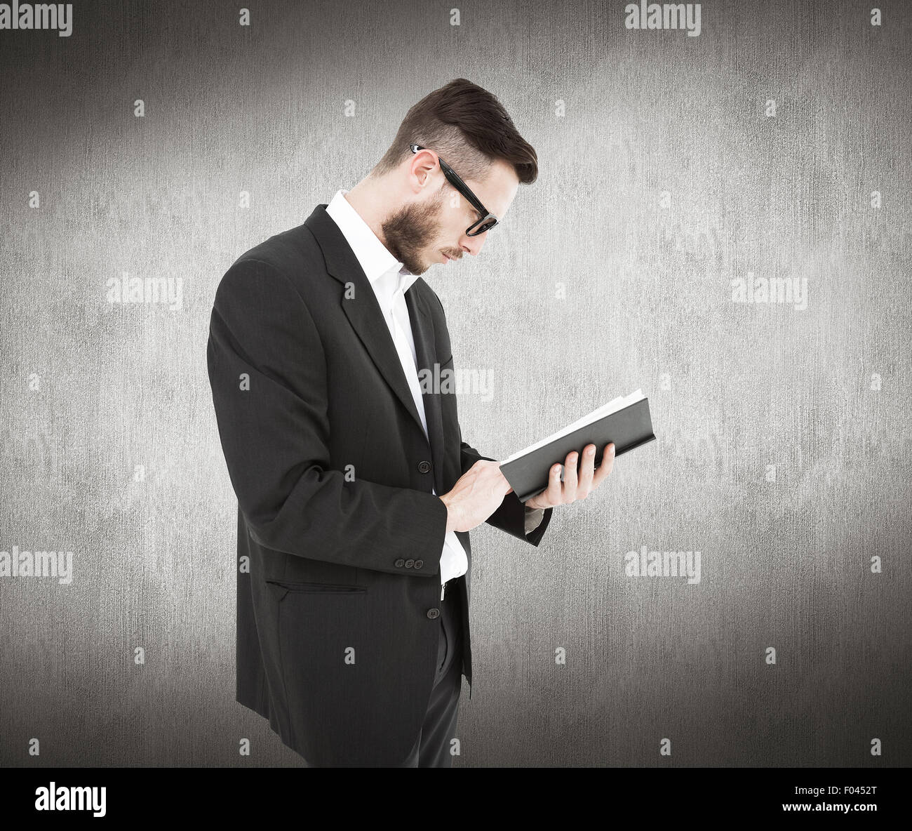 Serious young man reading hi-res stock photography and images - Alamy