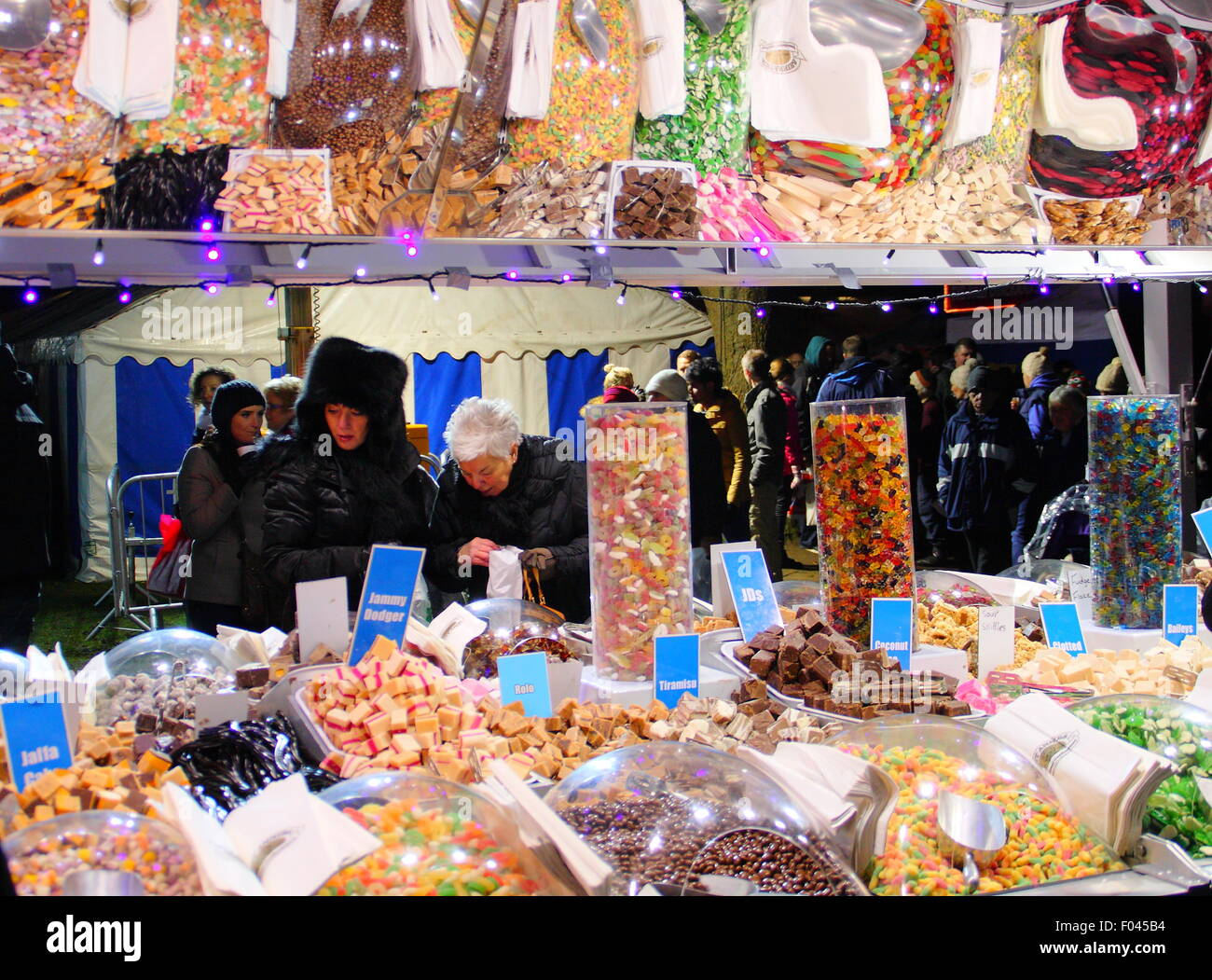 People peruse sweet treats on a confectionery stall at Lincoln ...