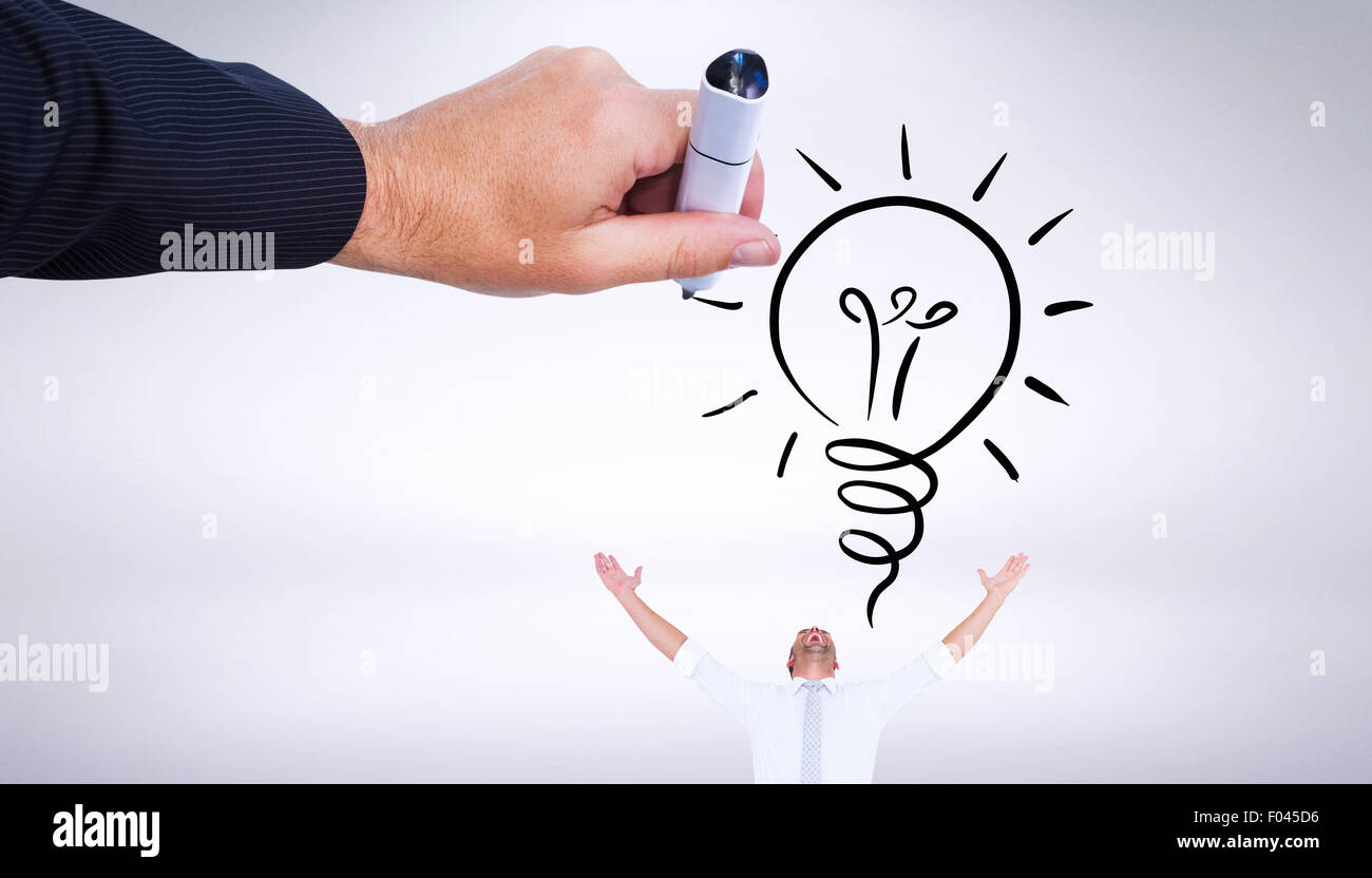 Composite image of hand drawing light bulb Stock Photo - Alamy
