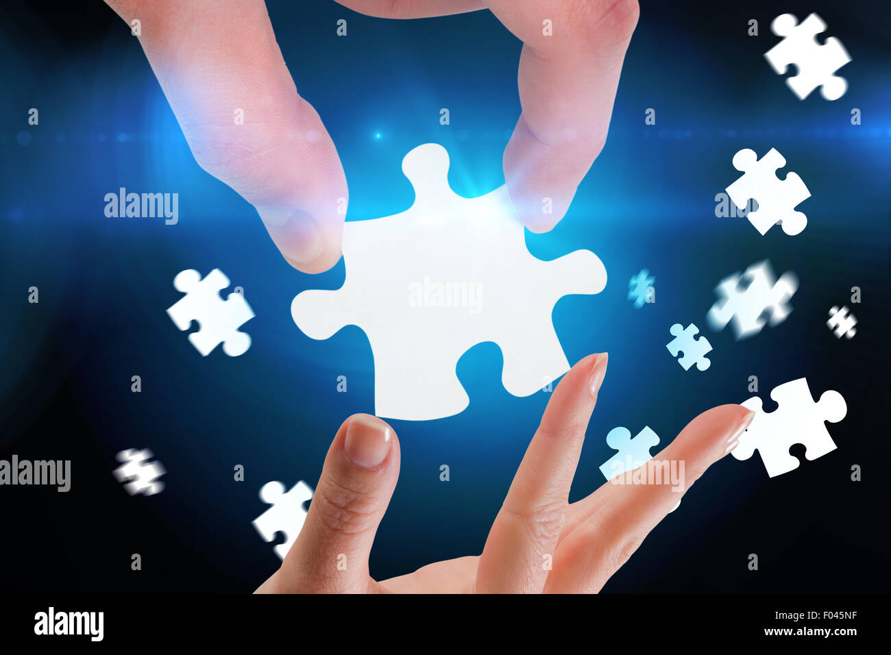 Jigsaw of hands hi-res stock photography and images - Alamy